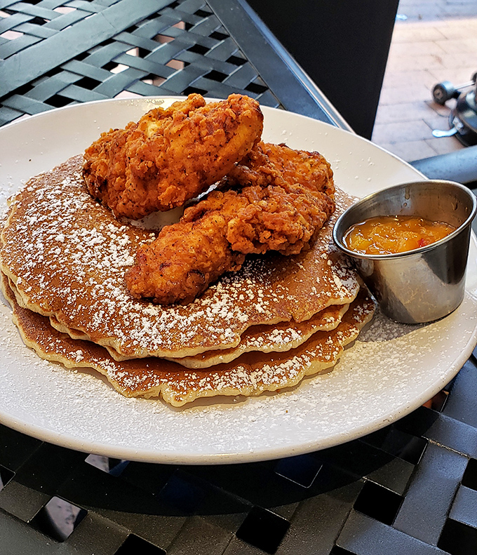 Fried chicken perched atop golden pancakes – the breakfast equivalent of finding out your favorite band is playing in your hometown.