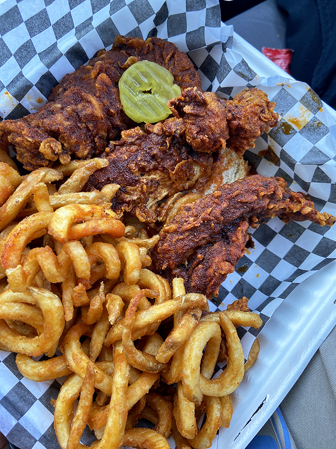 Curly fries and chicken tenders: the dynamic duo that proves comfort food doesn't need to be complicated to be extraordinary.