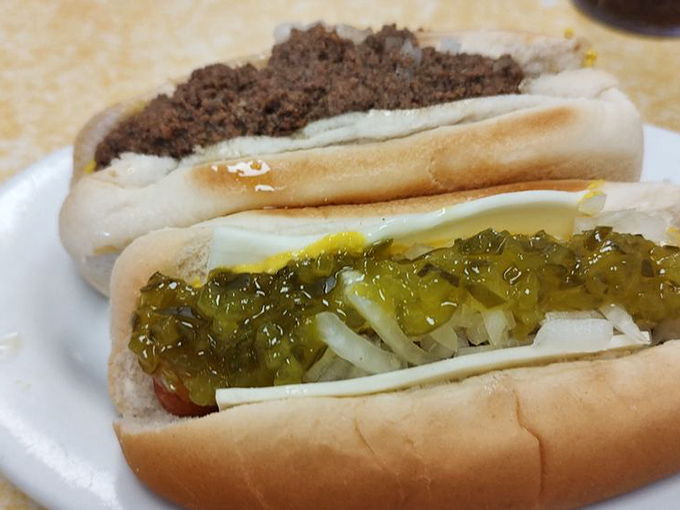 The works: where every topping fights for your attention but somehow creates perfect harmony. It's democracy in a bun. 