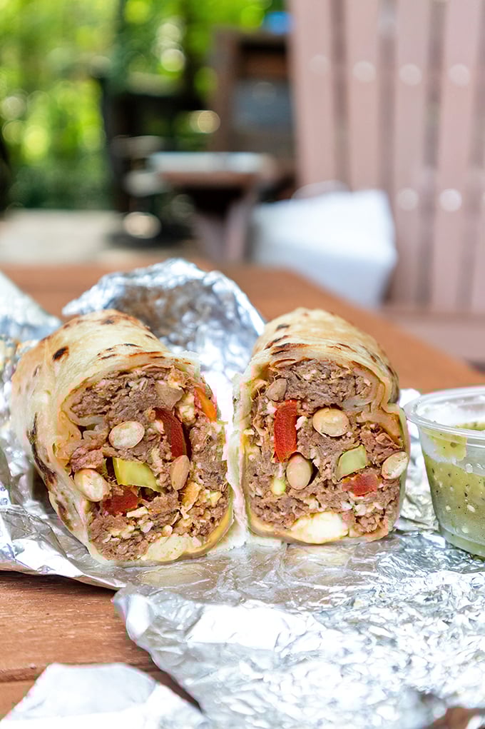 A study in textural contrast &ndash; this burrito combines proteins, beans and crisp vegetables in a tortilla wrapper that deserves its own fan club.