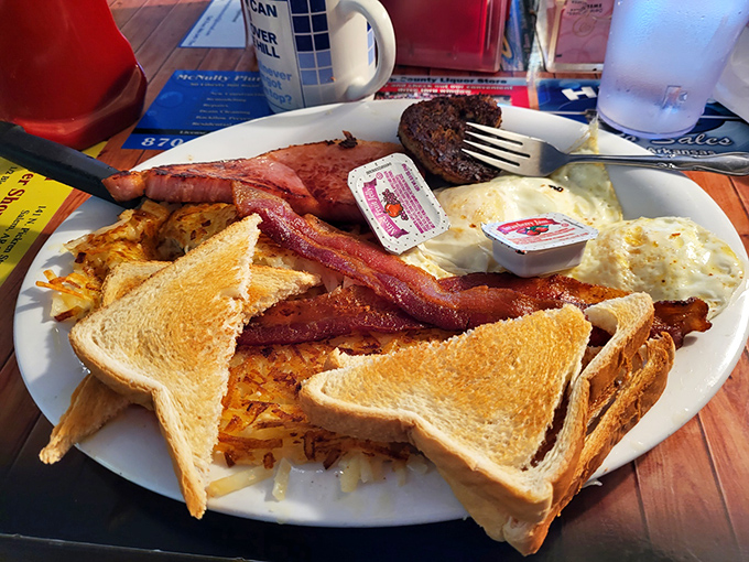 The breakfast plate that launched a thousand productive mornings. Those hash browns have achieved the crispiness that lesser potatoes only dream about.