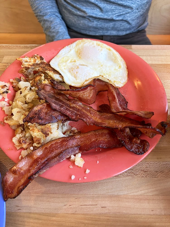 Bacon, eggs, and potatoes&mdash;the holy trinity of breakfast done right. Notice how the eggs are perfectly cooked? That's not luck, folks.