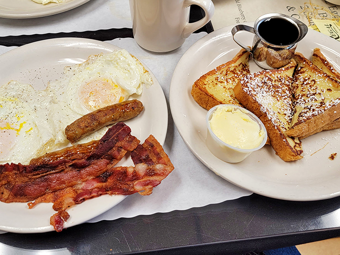 French toast dusted with powdered sugar alongside eggs and bacon&mdash;proof that sometimes the classics become classics for a very good reason.