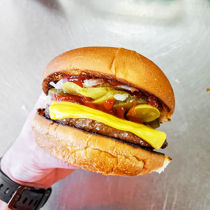 Simple perfection between two buns. That char on the patty is the diploma from the University of Doing Things Right.