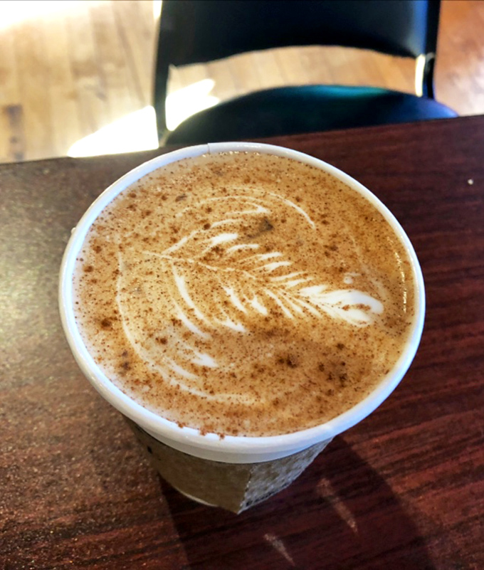 Another leafy masterpiece that makes you wonder if the barista missed their calling as a Renaissance painter. Coffee as canvas!