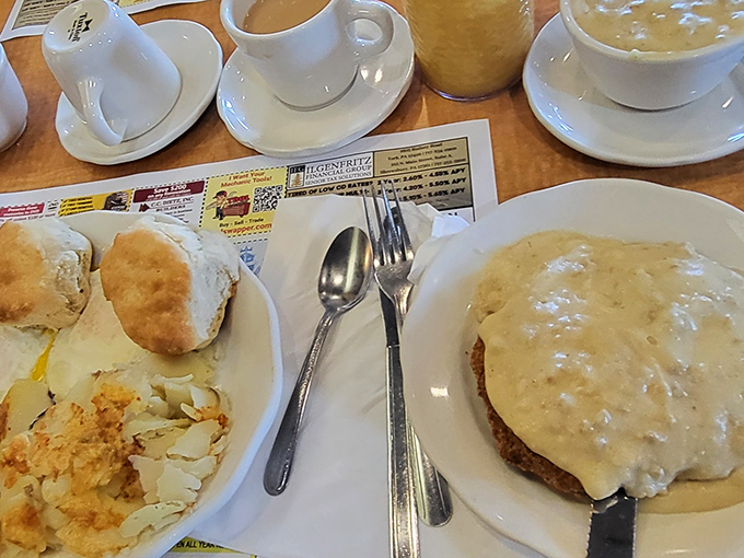 This is what diner dreams are made of &ndash; golden country fried steak with gravy cascading over the edges like a delicious waterfall. 