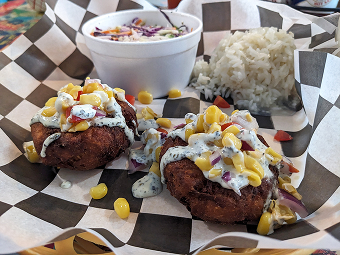 Two crab cakes, coconut rice, and coleslaw&mdash;a trio so perfect they could release an album together and top the charts.