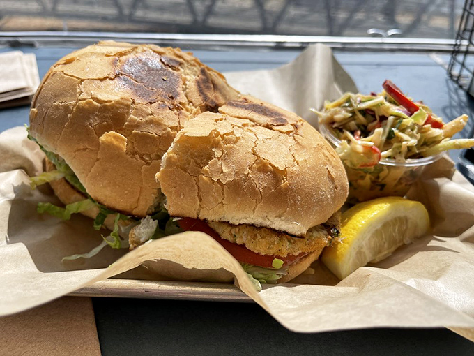 A sandwich that requires both hands and your full attention. This crab cake creation demands respect &ndash; and plenty of napkins.