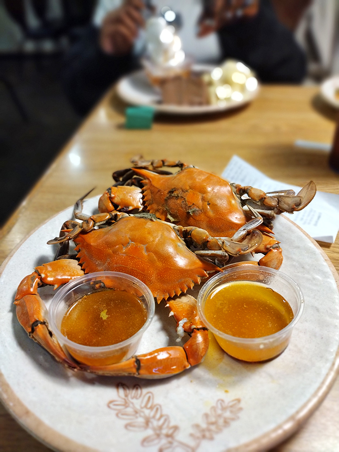 Whole crabs lounging on a plate like they're at a spa. Add butter, and suddenly you're having a better day than anyone else.