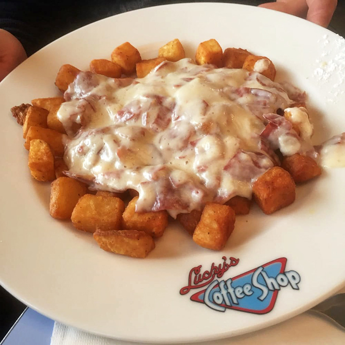 Cream chipped beef: the dish that launched a thousand nicknames. Lucky's version blankets golden potatoes in velvety, savory perfection.