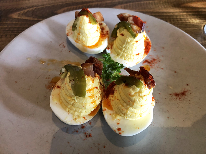 Four perfect bites of heaven. These deviled eggs with their creamy centers and savory toppings are worth every minute of the drive to Dublin.