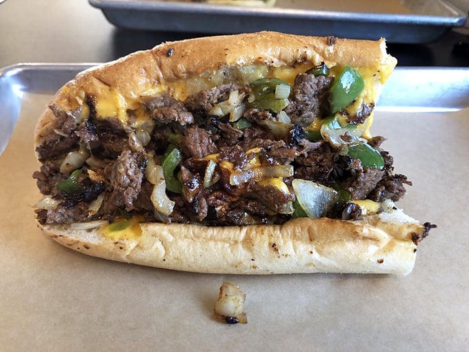 When they say "Deluxe," they mean business. This isn't just a sandwich; it's an architectural achievement of beef, cheese, and peppers.