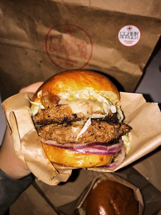 Double the burgers, double the joy. These twin beauties share a metal tray with hand-cut fries that deserve their own fan club.