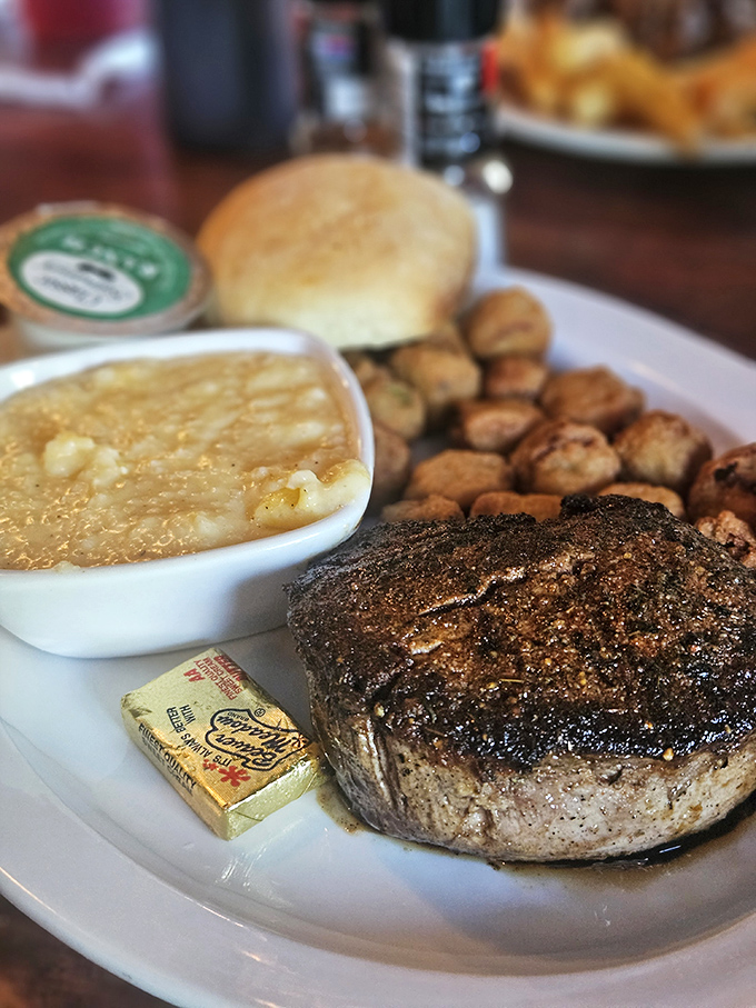 Filet mignon cooked with the respect it deserves, alongside mushrooms saut&eacute;ed to bring out their earthy magic. The roll isn't decoration&mdash;it's for sauce cleanup duty.