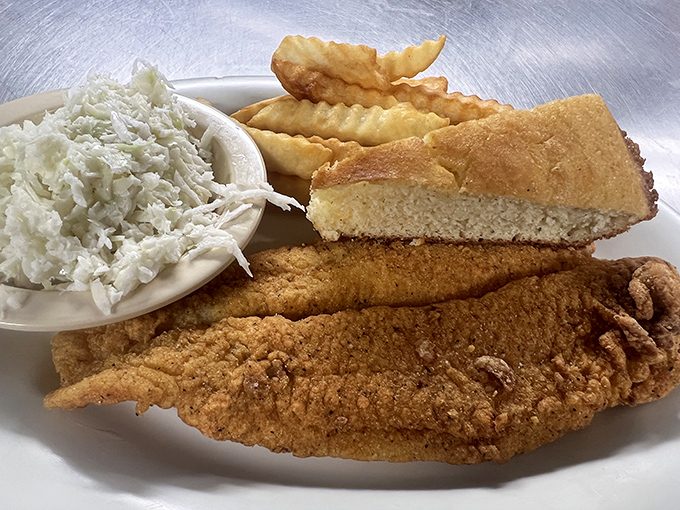 This isn't just fish and chips&mdash;it's the reason elastic-waist pants were invented, with cornbread that deserves its own fan club.