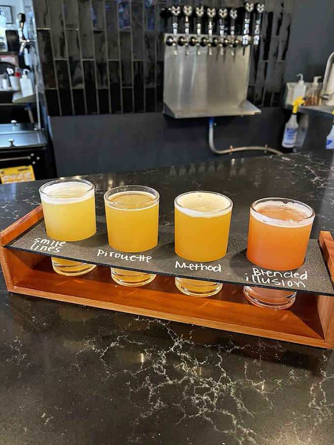 The beer flight board—civilization's greatest invention since sliced bread. Four distinct personalities waiting to introduce themselves to your taste buds.