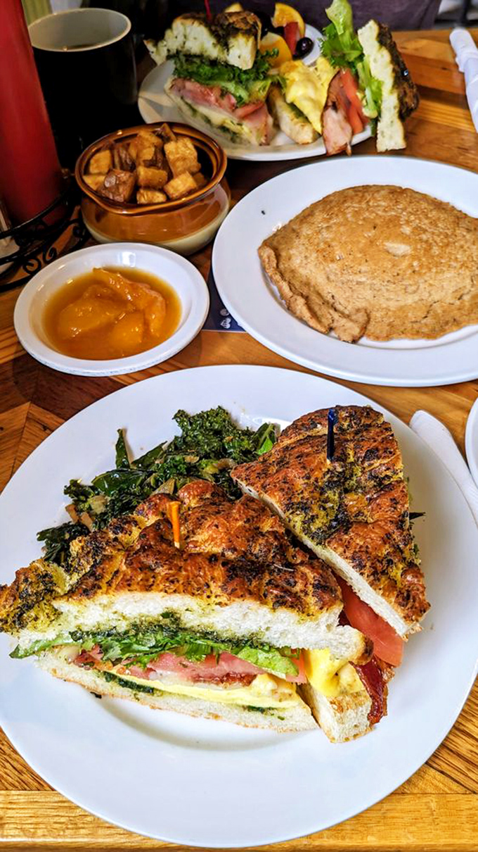 Sandwich artistry that makes you wonder why you ever settled for drive-thru breakfast. Those layers deserve their own museum exhibit.