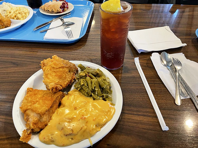 Fried chicken, green beans, and cheese-covered potatoes&mdash;the holy trinity of Midwest comfort that makes even the most sophisticated palates surrender unconditionally.