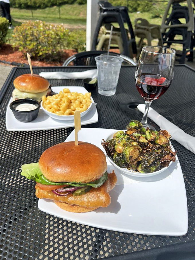 Outdoor dining elevated: burgers, crispy brussels sprouts, and wine combine for a trifecta of pleasures that would make any five-star general proud.