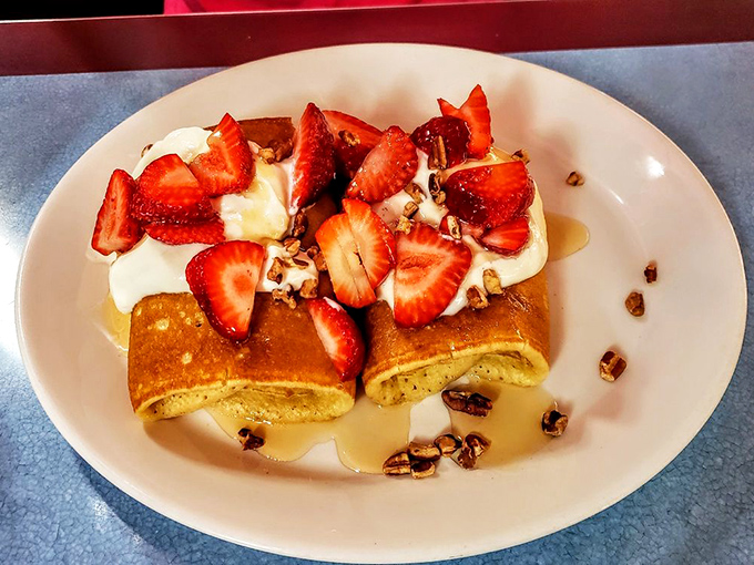 These pancakes topped with fresh strawberries aren't just breakfast&mdash;they're dessert with permission to eat it before noon.