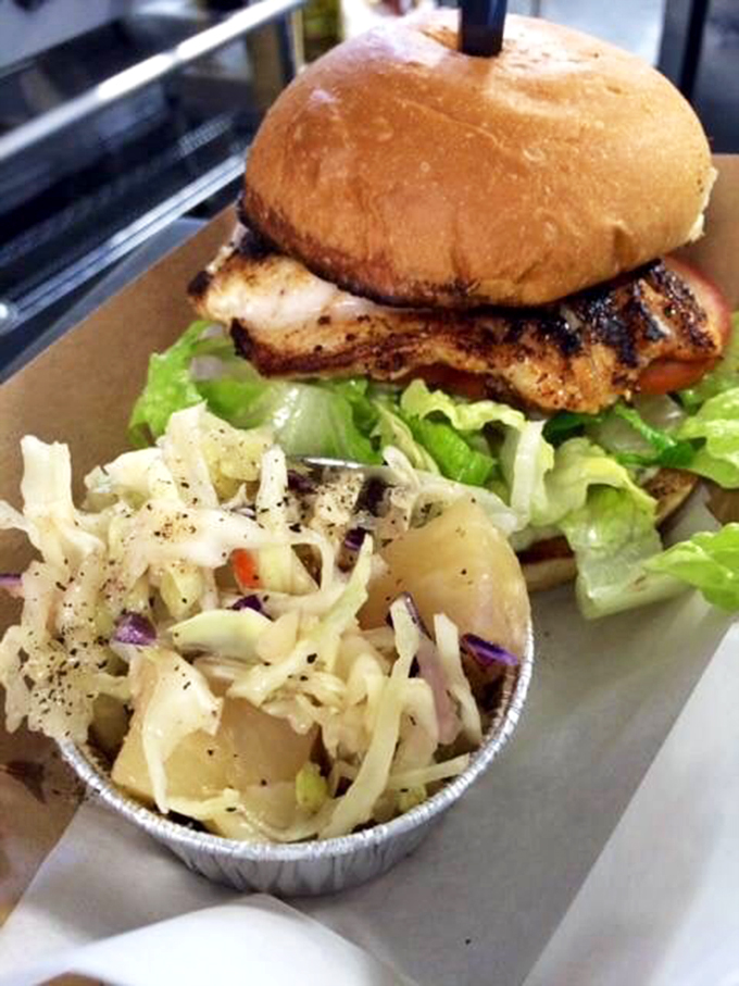 The holy grail of Florida sandwiches: perfectly grilled grouper on a toasted bun with fresh lettuce. Poets have written sonnets about less impressive subjects.