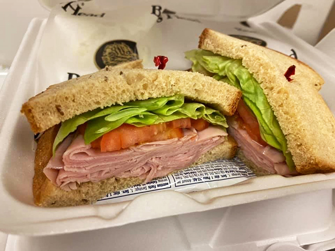 Simplicity elevated to art form &ndash; ham stacked with precision, fresh veggies, and bread that knows its supporting role perfectly.