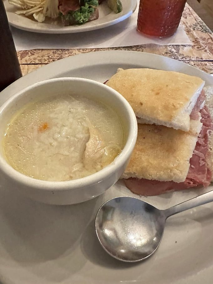 A perfect marriage: Brunswick stew's hearty embrace alongside ham biscuits. Like comfort food got dressed up for Sunday dinner but kept its down-home soul.