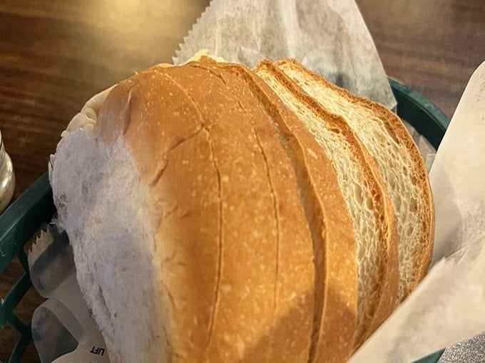Pillowy white bread that knows its supporting role. The perfect tool for sopping up every last drop of that magical gravy.