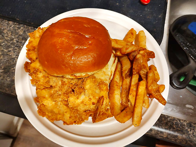 The Hoosier tenderloin: Indiana's answer to "how can we improve a sandwich?" Make it bigger than the plate, of course!