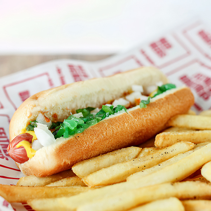 Classic Americana on a plate – where the crispy fries play loyal sidekick to the real superhero in the bun.