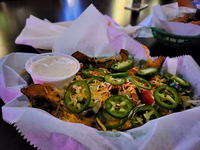 These aren't just fries—they're a commitment to excess done right. Cheese, bacon, and green onions transform the humble potato into a celebration.