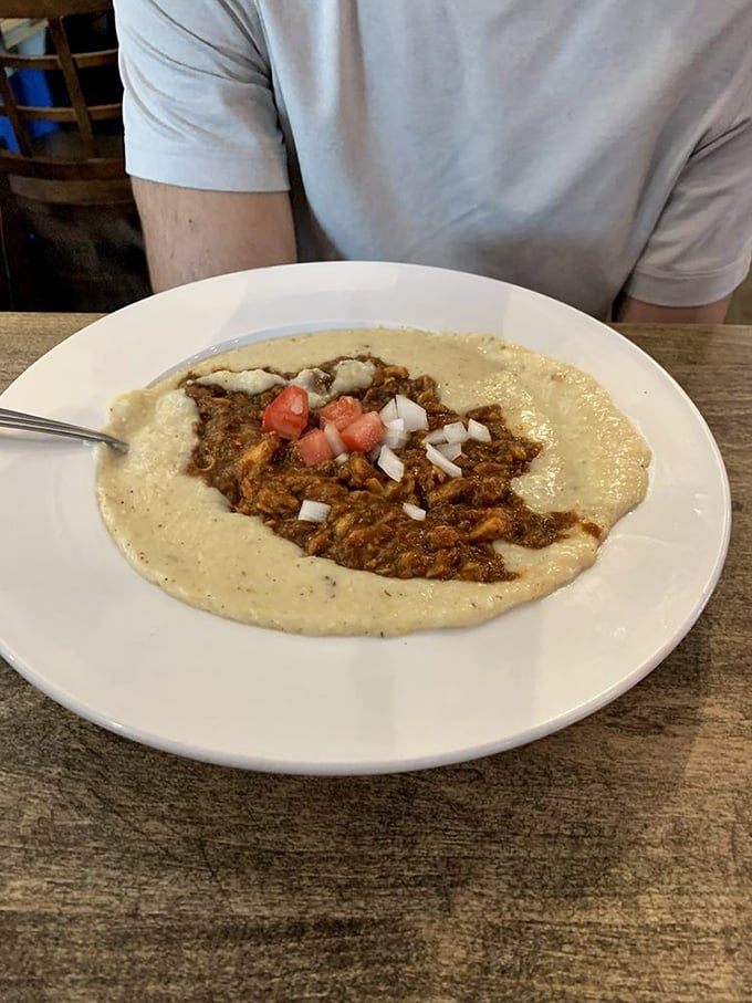 These jerk chicken cheesy grits aren't just a meal&mdash;they're a warm hug in a bowl, with the perfect kick of spice to wake up your taste buds.