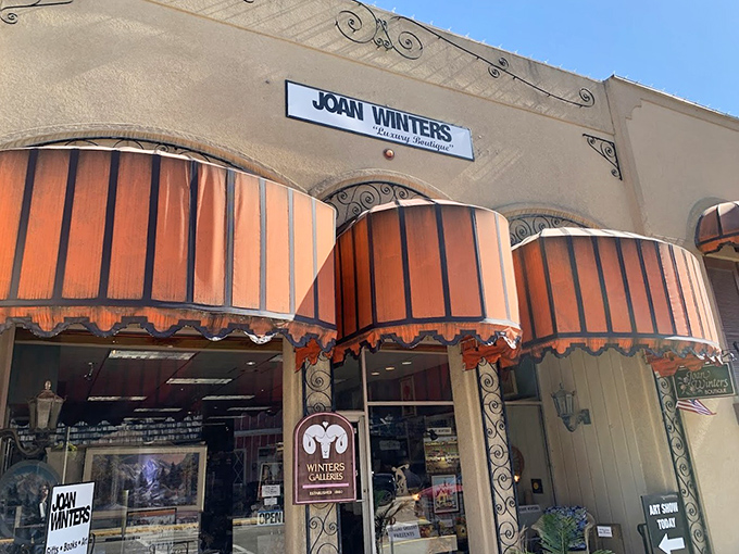 Joan Winters Gallery brings artistic flair to Arthur's main street, those distinctive orange awnings creating a splash of color against the historic fa&ccedil;ade.