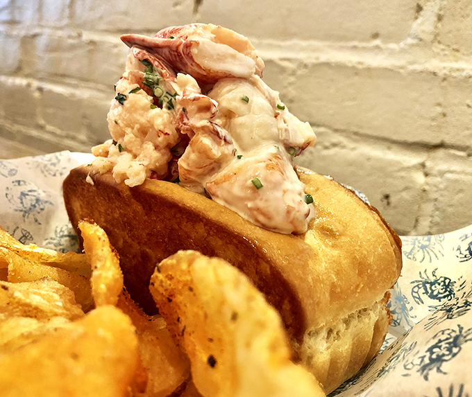 A perfect marriage: buttery lobster roll meets golden fries. Together, they form a coastal power couple that would make Neptune himself jealous.