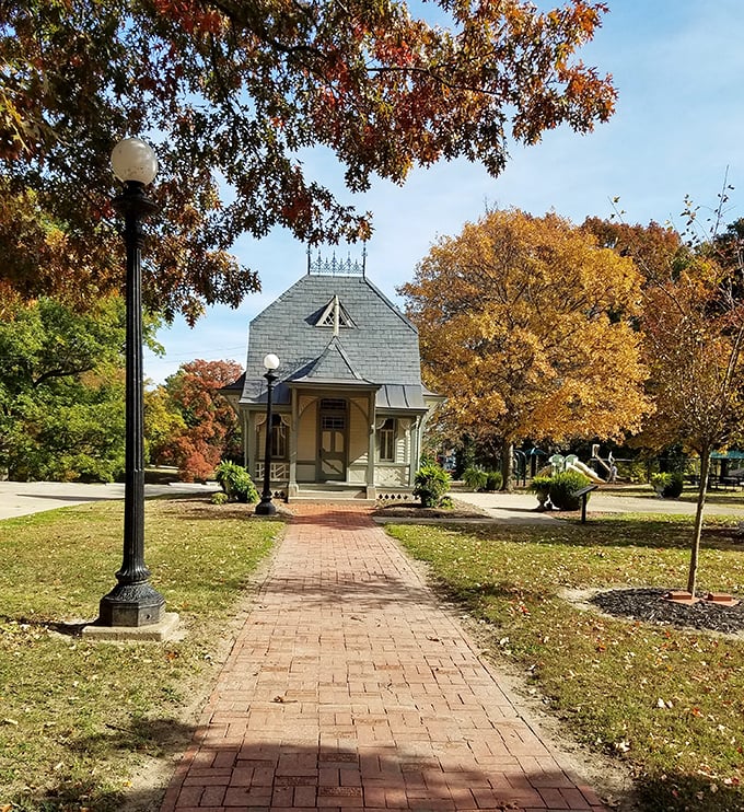 The Lucy Haskell Playhouse sits like a Victorian dollhouse come to life, surrounded by autumn's golden palette&mdash;small-town magic that costs nothing to admire.