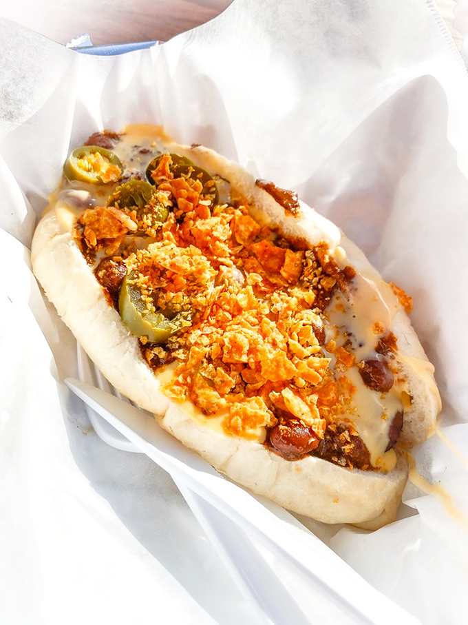 Layer upon glorious layer of textures and flavors. This isn't just a hot dog&mdash;it's an architectural achievement you can eat.