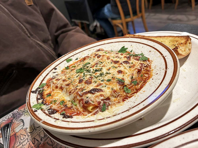 Bubbling cheese blankets this baked pasta dish, creating that Instagram-worthy cheese pull moment that's somehow even more satisfying at 6,000 feet elevation.