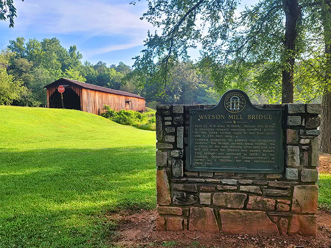 History carved in stone&mdash;this marker tells stories of mill days past while the bridge continues writing new chapters.