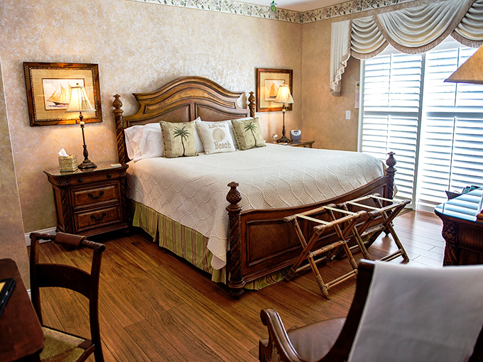 The Melbourne room showcases old-world charm with its four-poster bed and warm wood tones&mdash;like sleeping in a maritime captain's quarters, minus the seasickness.