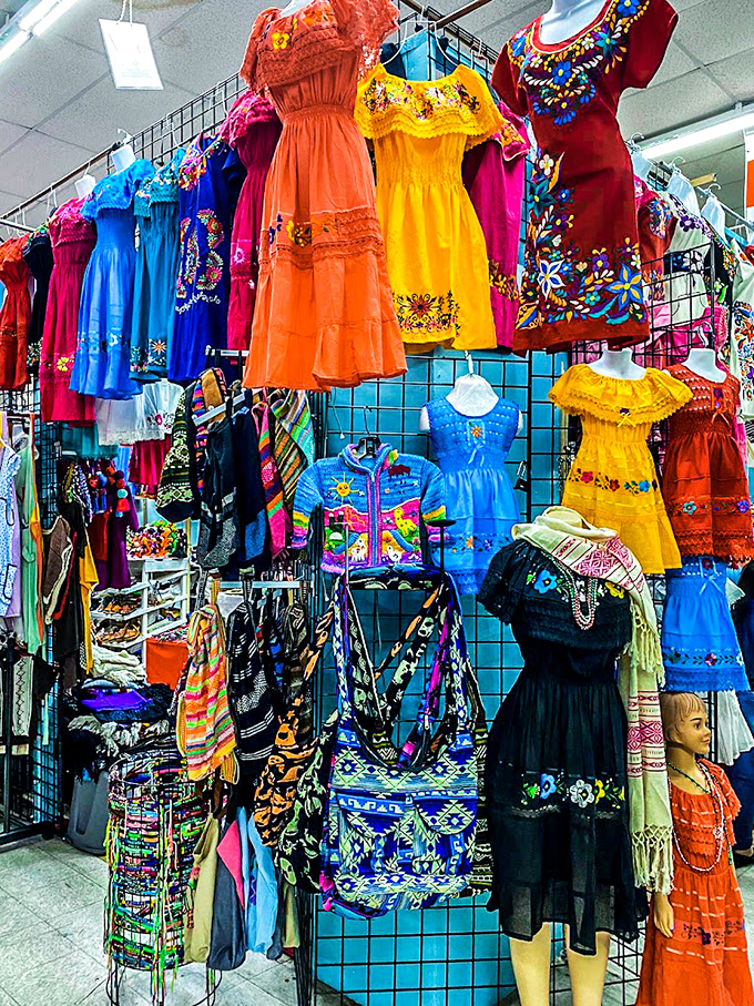 A kaleidoscope of traditional dresses bursts with hand-embroidered stories, each stitch connecting Indianapolis to centuries of artisanal craftsmanship thousands of miles away.