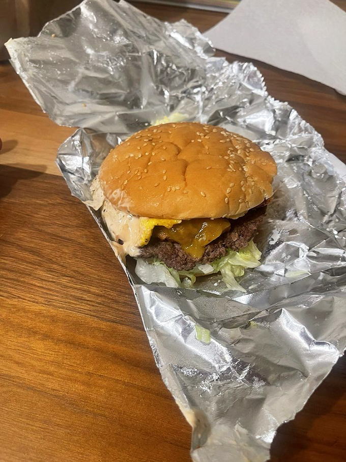 Mike's special burger doesn't need a fancy introduction&mdash;just look at that cheese cascade and perfectly charred patty speaking the universal language of deliciousness. 