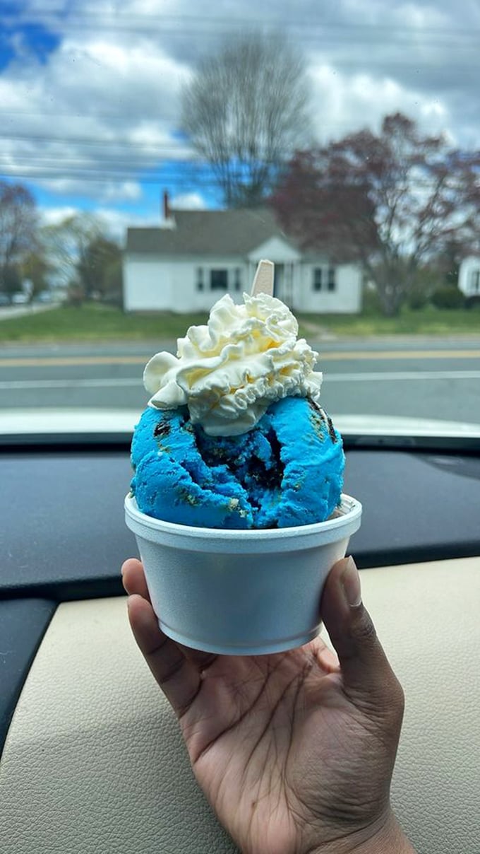 Blue Monster meets creamy topping—a combination that would make Cookie Monster abandon cookies altogether. Car dashboard dining at its finest.