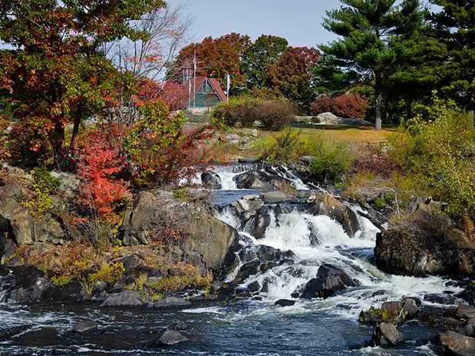 Nature puts on its autumn spectacular at Putnam's waterfall, where the rushing water provides the soundtrack to fall's most vibrant color show.