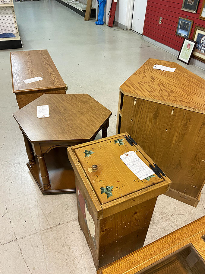Wooden end tables with character marks tell stories of coffee spills and homework sessions from their previous lives, now awaiting new chapters.