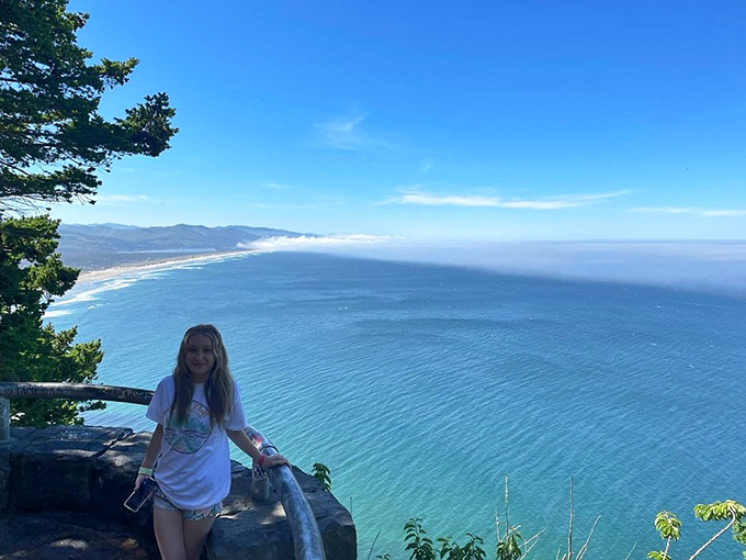 Dramatic cliffs plunge into emerald waters, creating the kind of view that makes smartphone cameras work overtime.