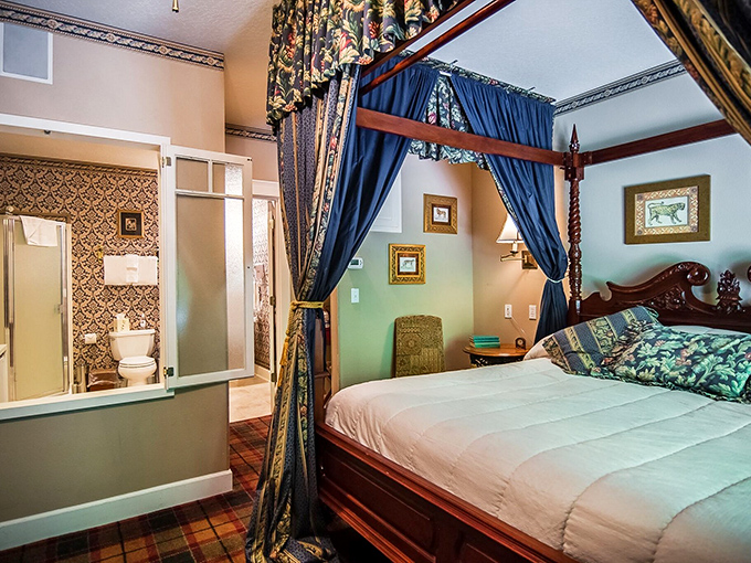 Mint-green walls and crisp white bedding create the kind of serene retreat that makes you wonder why your own bedroom feels like a storage unit.