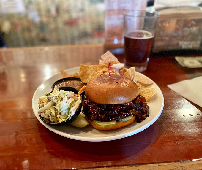 This isn't just a sandwich; it's pulled pork perfection that would make any pitmaster tip their hat in respect.