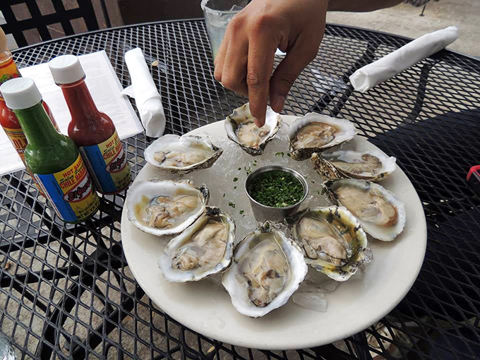 Fresh oysters on the half shell: ocean treasures served with mignonette that makes you want to high-five the sea.