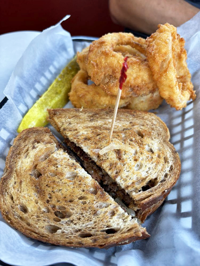 Toasty rye, melty cheese, and that perfect ratio of meat to sauerkraut. If sandwiches were art, this would be hanging in the Louvre.