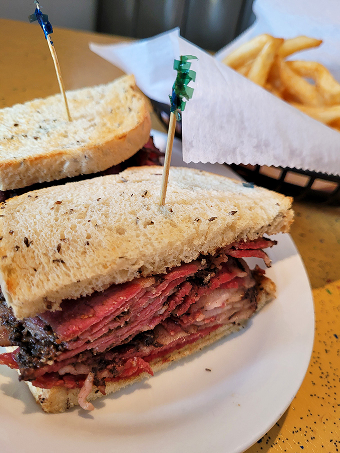 Meat stacked higher than Manhattan rent prices. This sandwich doesn't just feed you&mdash;it makes a statement about your commitment to excellence.